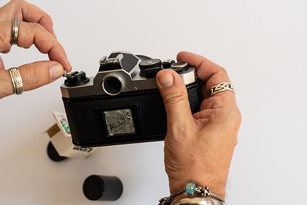 How To Load 35mm Film - wind the rewind knob very gently to take up the ...